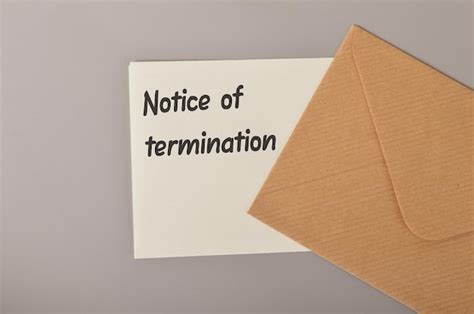 Premium Photo Brown Envelope And White Paper Written With Notice Of Termination