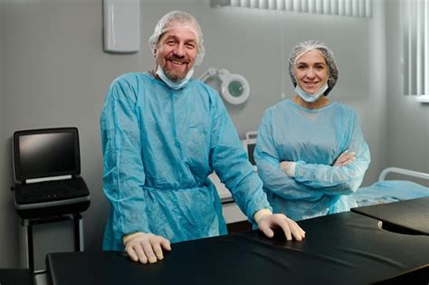 Premium Photo Surgeon And Assistant In Operating Room