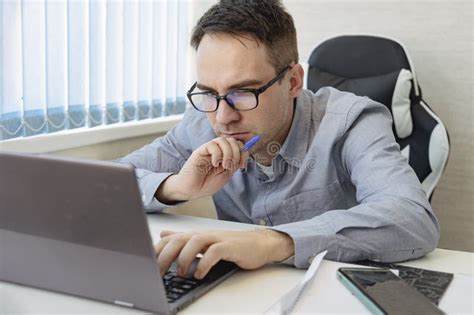 Attractive Focused Professional Guy Coding Programming Supporting