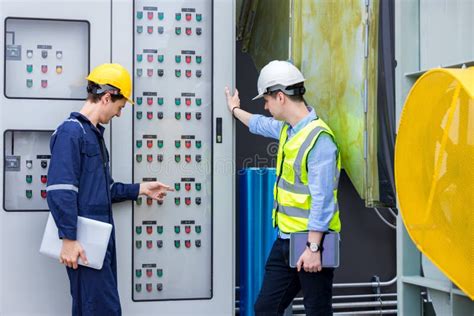 Electrical Engineer Working In Control Room Electrical Engineer Man Checking Power Distribution