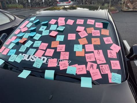 Pink Sticky Note On Car