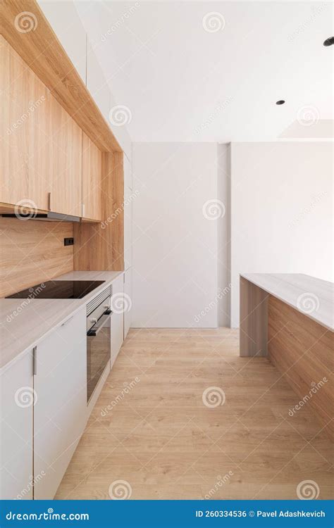 Modern Kitchen Interior With Island And Wooden Furniture Empty And