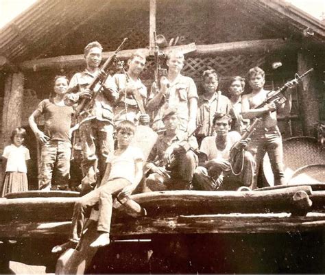Macv Sog Fred Gassman And Jack Damoth With Recon Team Trowel Montagnard Fighters In A Village