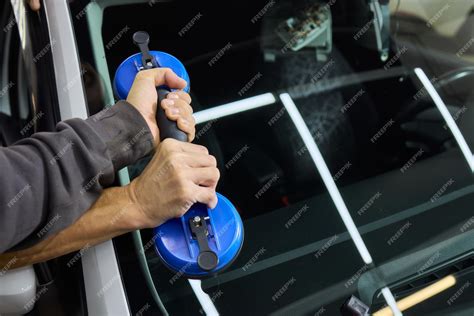 Premium Photo Installing Windshield On A Car With Automotive Design