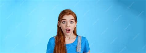 Premium Photo Shocked Redhead Girl React Omg Shook Drop Jaw
