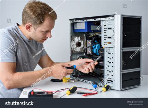 Man Fixing Computer Closeup Stock Photo 1836988534 Shutterstock