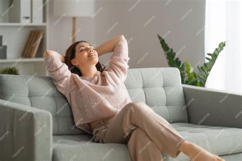 Premium Photo Portrait Of Beautiful Woman Resting On A Sofa At Home