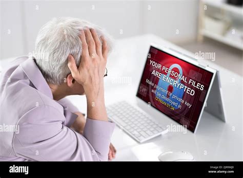 Ransomware Cyber Attack Showing Personal Files Encrypted Screen Stock