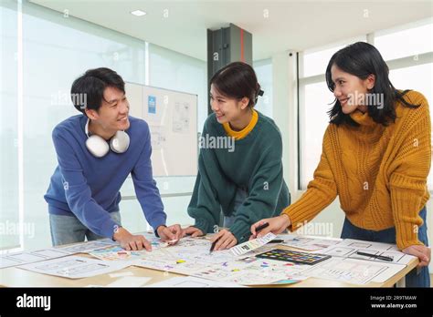 Team Of Ux Developer And Ui Designer Brainstorming Interface Wireframe Designcreative Digital