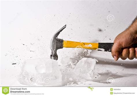 Break The Ice Frozen Action Of A Hammer Hitting A Bloc Of Ice Sponsored Ad Advertisement