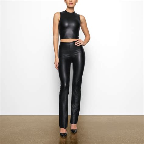 Faux Leather Crew Neck Cropped Top Onyx Skims Faux Leather Boots Faux Leather Leggings