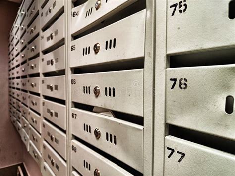 Po Boxes For Rent In Rows With Metallic Silver Doors And Numbers