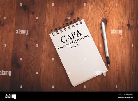 Notebook Showing Capa Acronym For Corrective And Preventive Action Background For Business