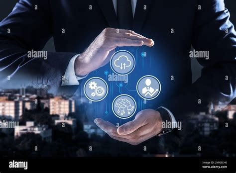 Man Demonstrating Machine Learning Model With Different Icons And Night