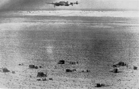 Luftwaffe Messerschmitt Bf 110 Flies Over A Motorized Unit In The