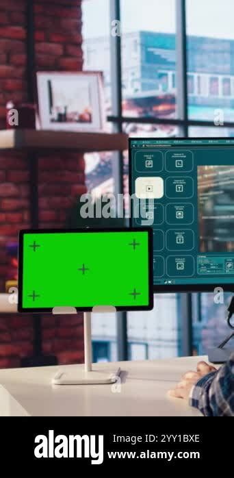 Man In Home Office Uses Ai Program Turning Text Prompt Into Videos Next To Isolated Screen
