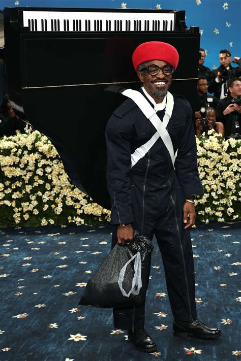 André 3000 Straps Giant Piano to His Back at 2025 Met Gala
