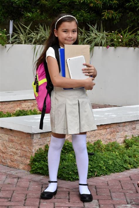 Stressful Youthful Diverse Girl Student Wearing Skirt With Notebooks