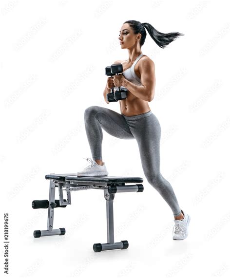 Fitness Woman Doing Jump Step Ups Exercise With Dumbbells On Bench Photo Of Attractive Woman In