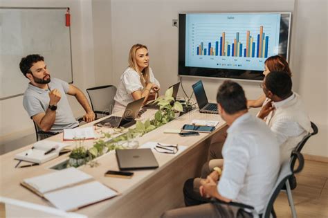 Multigenerational Business Team Collaborating On Profit Growth Analysis Stock Image Image Of