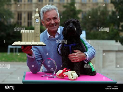 Mp Alan Duncan With His Cockapoo Noodle Who Was Announced As The Winner Of The Westminster