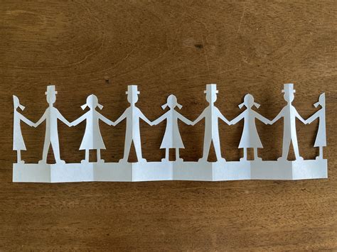 How To Make A Circular Paper Doll Chain Artofit