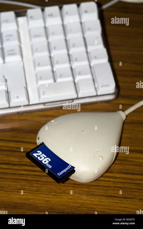 Compact Flash Memory Card In Card Reader Attached To A Computer Stock Photo Alamy