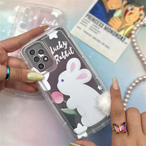 قاب گوشی سامسونگ ژله ای خرگوشی پام پام ایربگ دار ضد ضربه شفاف سفید محافظ لنز دار Galaxy A10s