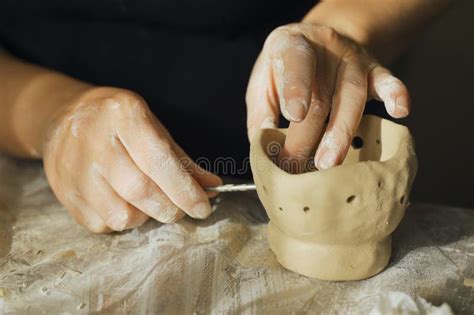 A Woman Makes Holes Using A Tool In A Clay Craft A Candlestick Stock Image Image Of Artist