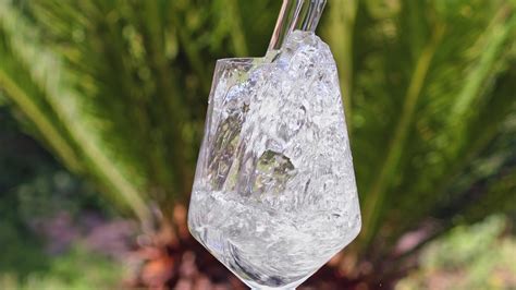 Pure Water Poured Into Glass Closeup Slow Motion Clear Fresh Drinking Water Filling Glass