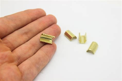 Compression Findings 14mm Gold Crimp Crimp Clip With Teeth Webbing