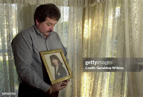 John Reina 45 Of Orange Holds A Photo Of His Sister Jocelyn Reina