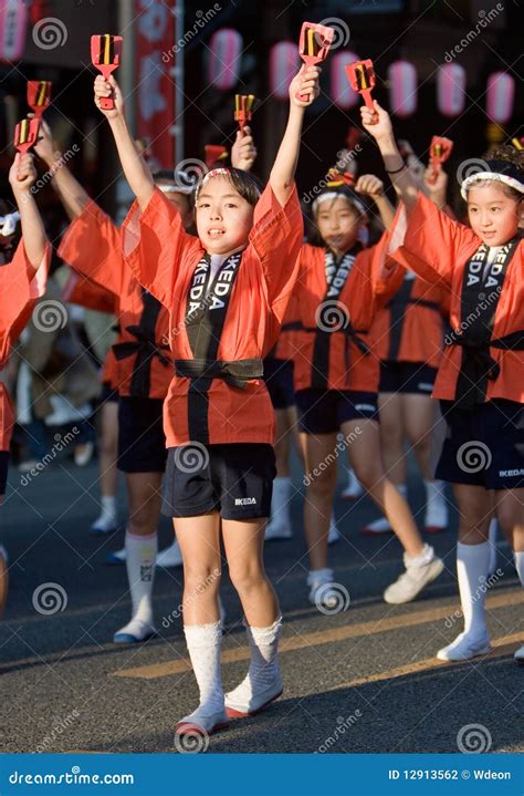 Japanese Men In Happi Kimono In Front Of A Yatai Cart In The Sensoji