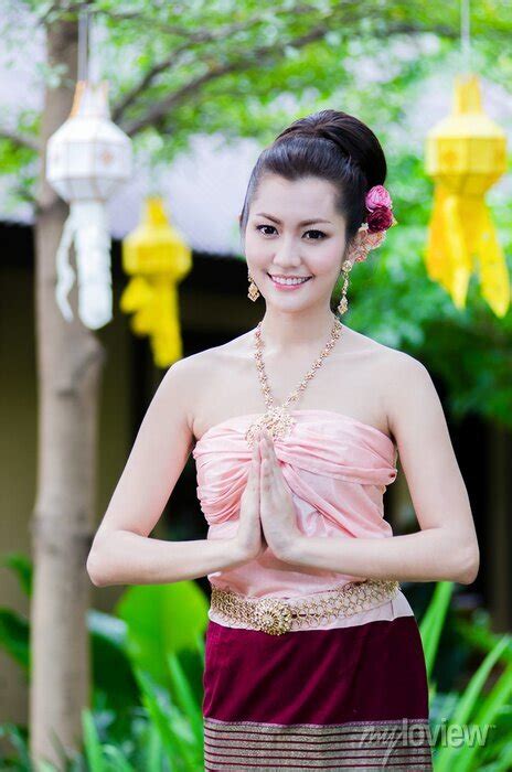 Beautiful Thai Girl In Thai Traditional Costume And Thais Greeting