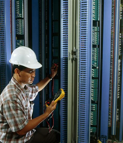 Man Testing Circuit Boards At Telephone Exchange Photograph By Geoff Tompkinson Pixels