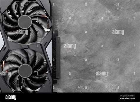 Computer Graphic Card Professional Video Card With Two Fans On Gray Concrete Background Top