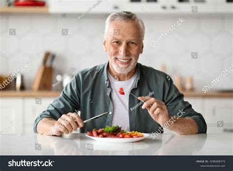 Old Man Eating Diet Food Over 5053 Royalty Free Licensable Stock
