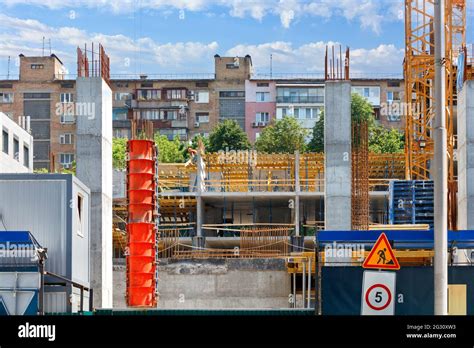 Erection Of Reinforced Concrete Columns At The Construction Site Using Orange Industrial