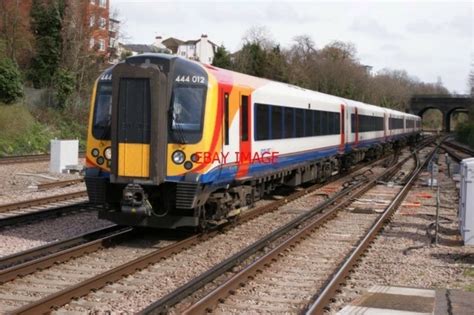 Photo Class 444 Desiro 5 Car Emu No 44 012 Speeds Through Surbiton On A