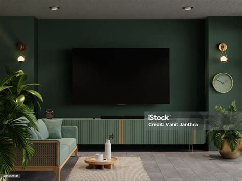 녹색 소파와 장식 액세서리가 있는 거실의 캐비닛에 녹색 벽걸이 Tv 미니멀한 디자인 텔레비전에 대한 스톡 사진 및 기타 이미지 텔레비전 텔레비전 산업 거실 Istock