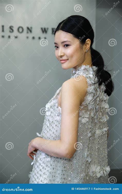 A Model Poses During The Allison Webb Spring 2020 Bridal Fashion