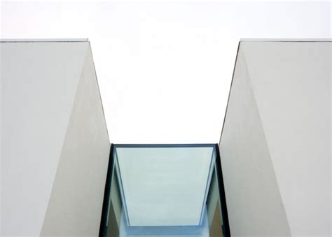 Volcanic Stone Wall Hides Doorway Into B25 House By Pk Arkitektar