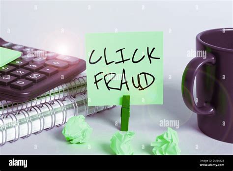 conceptual caption click fraud word written on practice of repeatedly clicking on advertisement