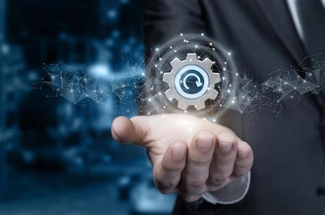 Premium Photo Business Update Concept Businessman Showing Gear With Update Icon