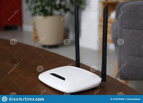 Modern Wi Fi Router On Wooden Table Space For Text Stock Photo Image Of Indoors Home