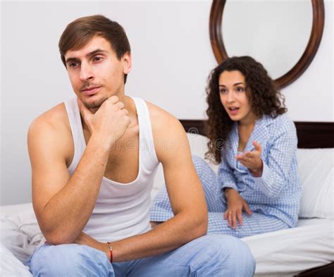Couple Sorting Out Relationships In Bed Stock Image Image Of