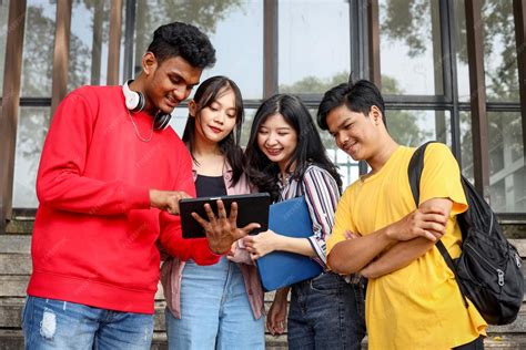 Premium Photo College Students Studying On Digital Tablet Preparing