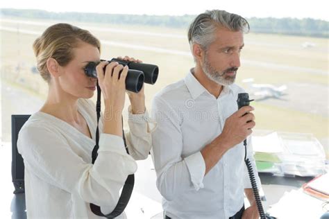 Woman And Man Monitoring Froma Space Mission Control Center Stock Image Image Of Technician