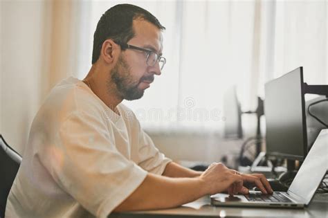 portrait professional man programmer working concentrated on computer