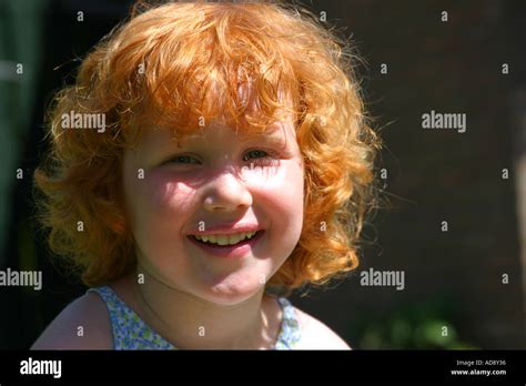 Pretty Smiling Redhead Stock Photo Alamy